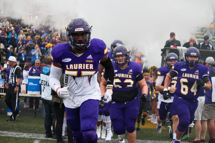 Wilfrid Laurier - Golden Hawks Fly High - Cosmos Sports & Entertainment